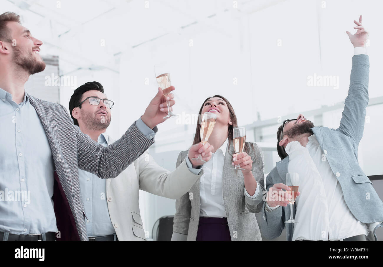 group of happy employees celebrate their success in the workplace Stock ...
