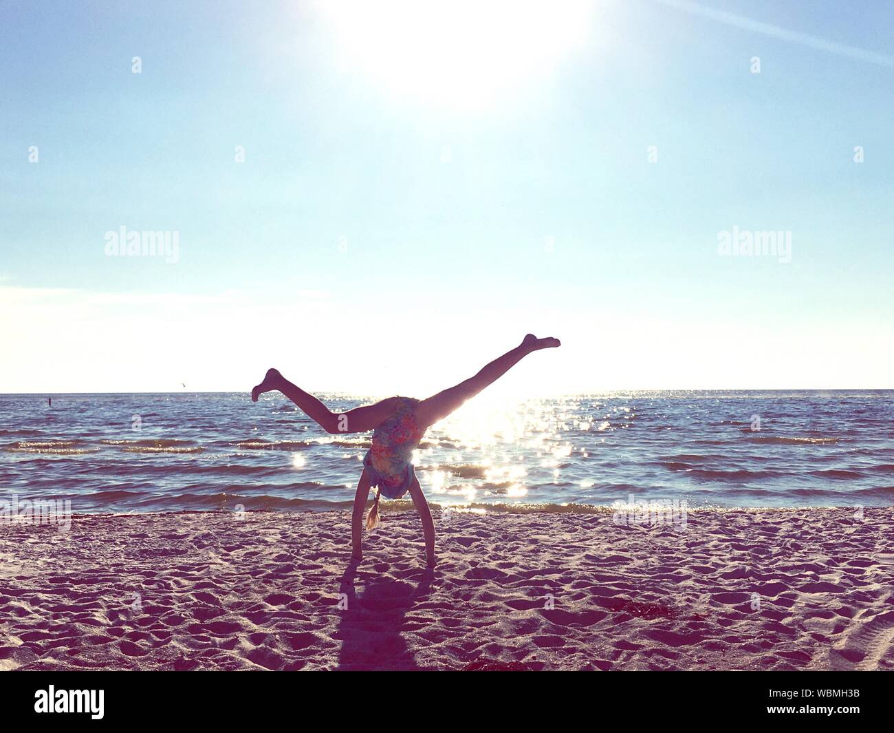 Cartwheel on the beach hi-res stock photography and images - Alamy