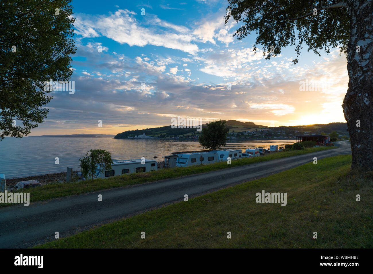 beautiful sunset over a norwegian camping Stock Photo - Alamy