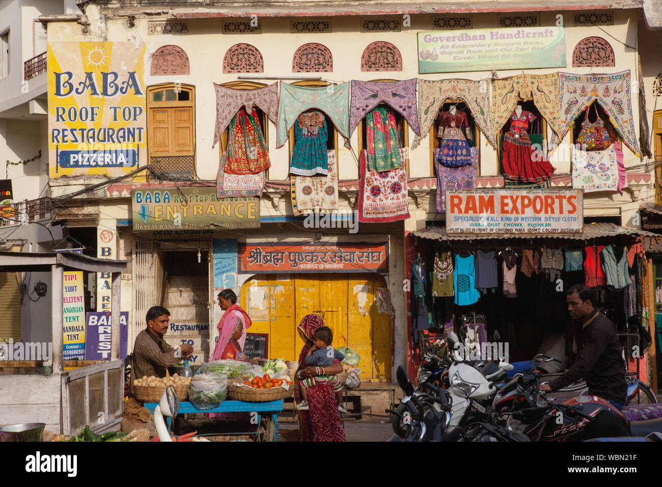 India, Rajasthan, Pushkar, Shop fronts and restaurant signs in Pushkar ...