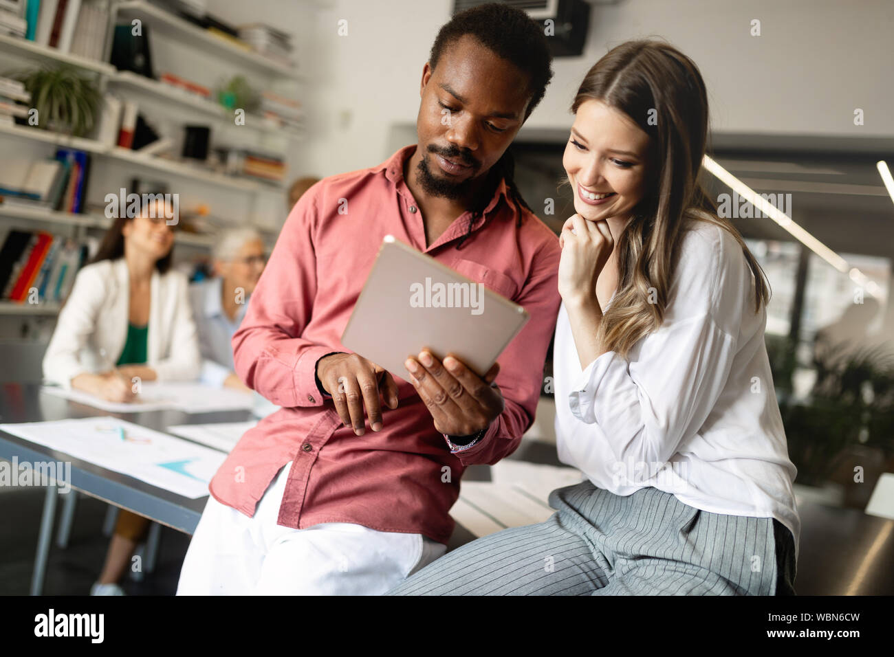 Group of successful business people at work in office Stock Photo - Alamy