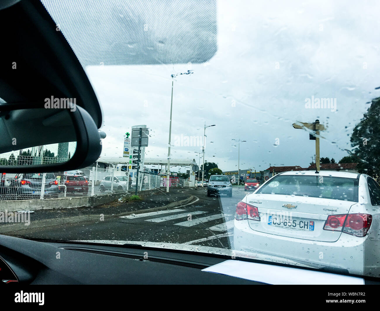 Driving through the suburbs hi-res stock photography and images - Alamy