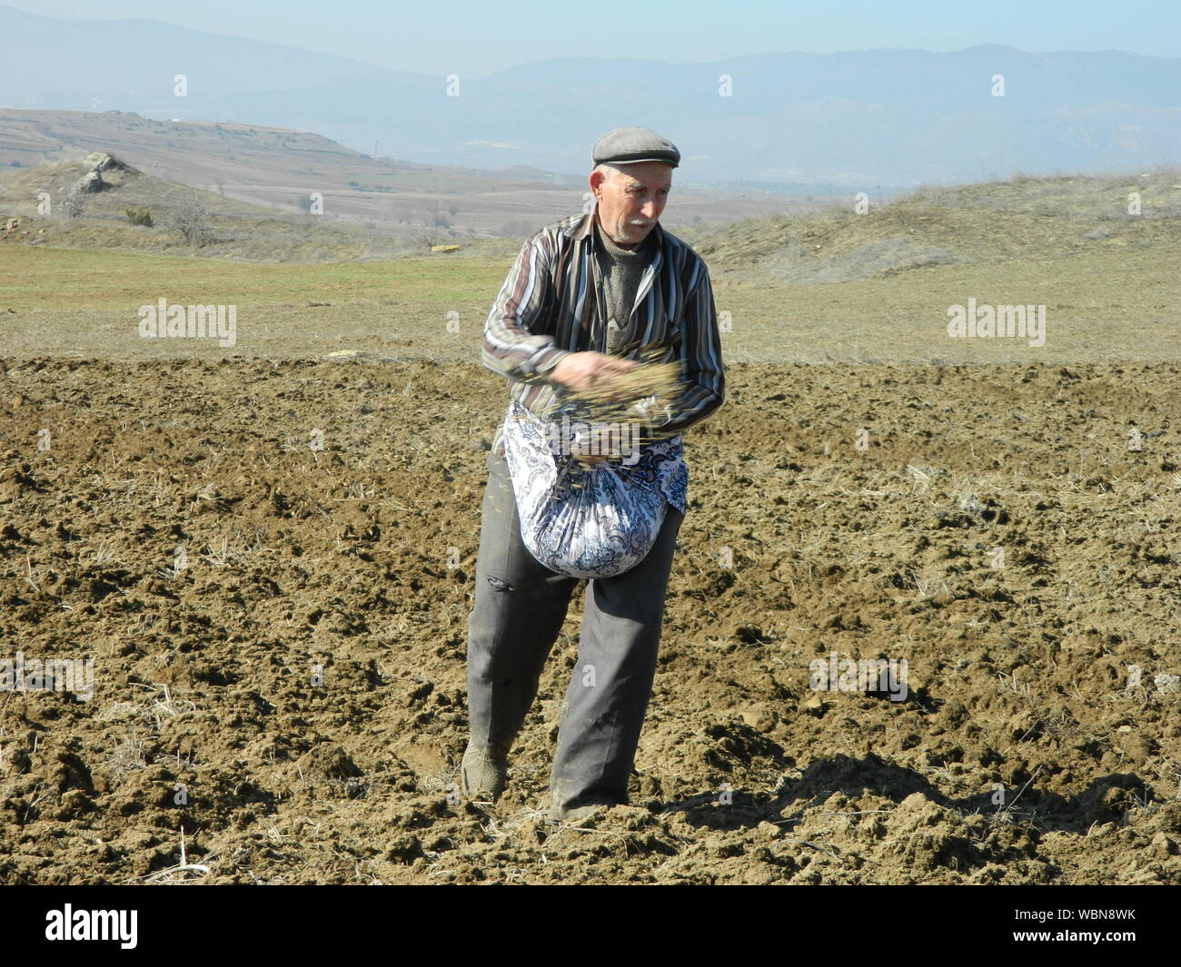 Seed scattering hi-res stock photography and images - Alamy
