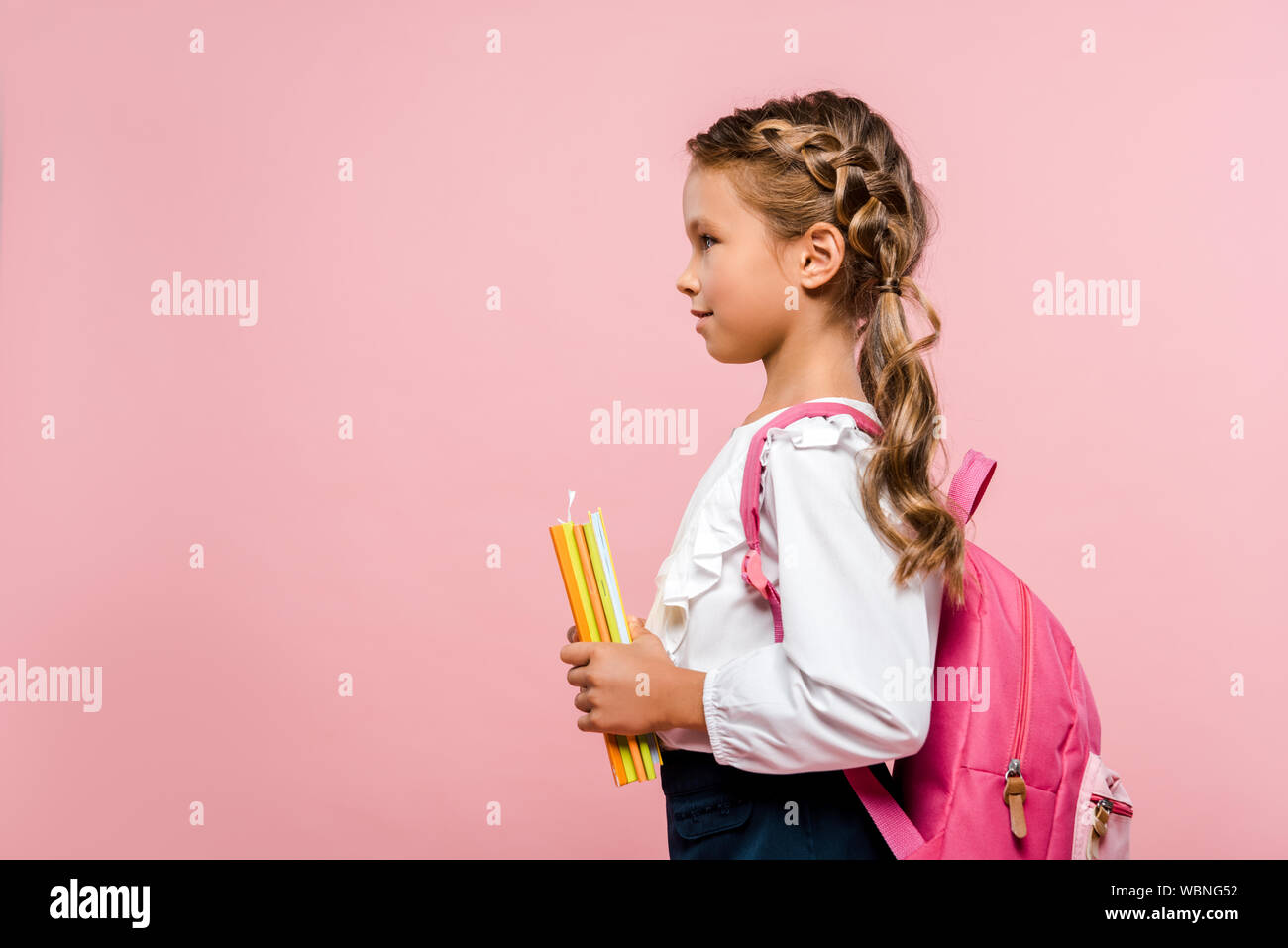 Side view schoolkid holding hi-res stock photography and images - Alamy