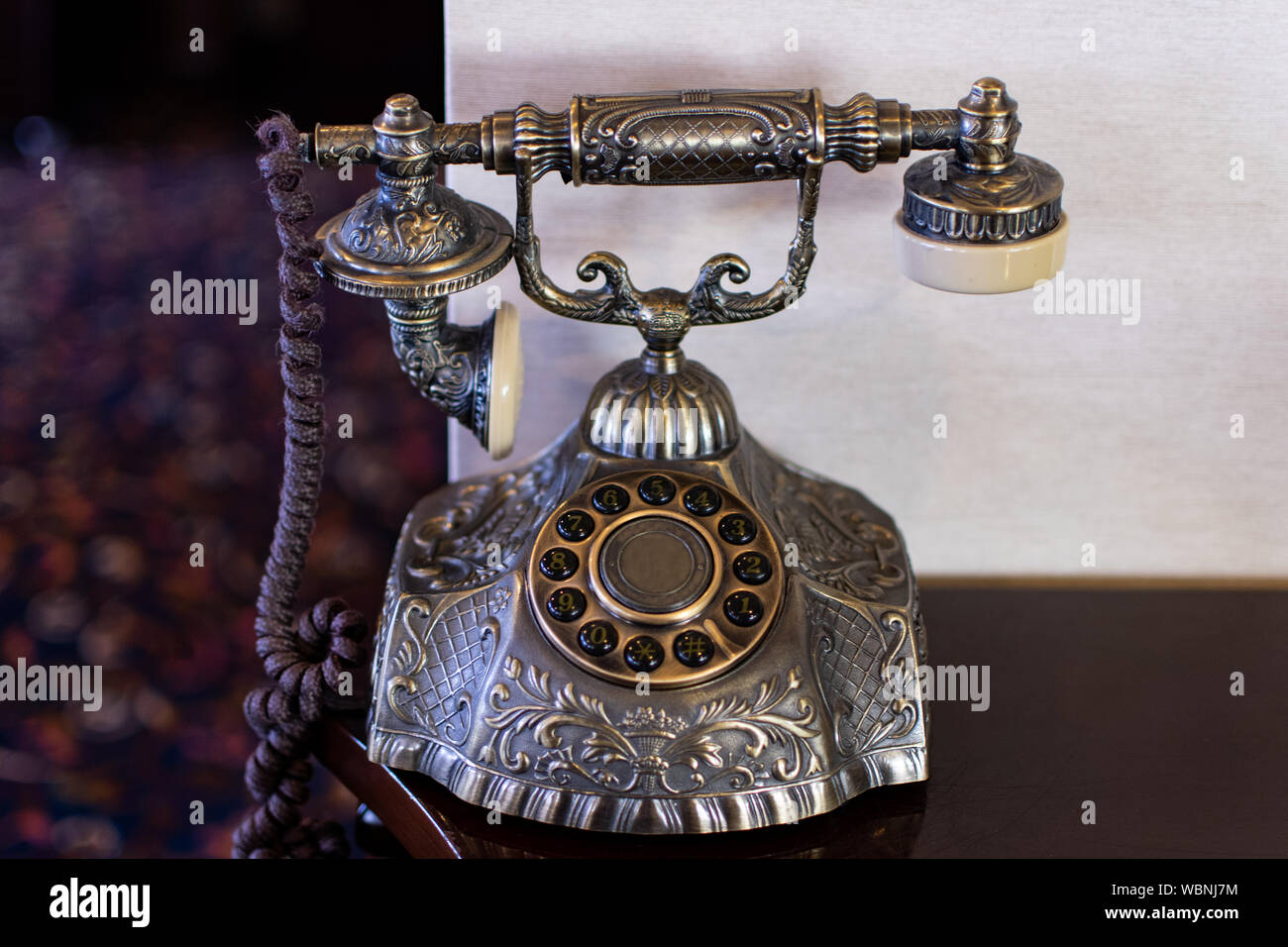 Beautifully embossed bronze antique classic telephone. Vintage ...