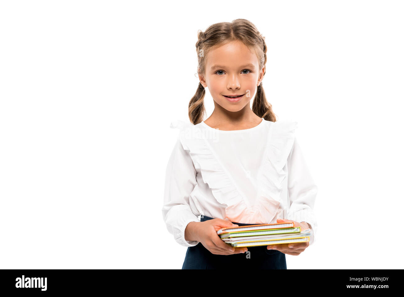 cheerful child holding books isolated on white Stock Photo - Alamy