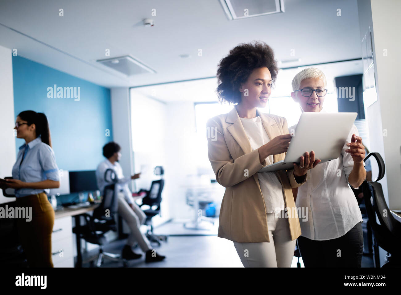 Successful business group of people at work in office Stock Photo - Alamy