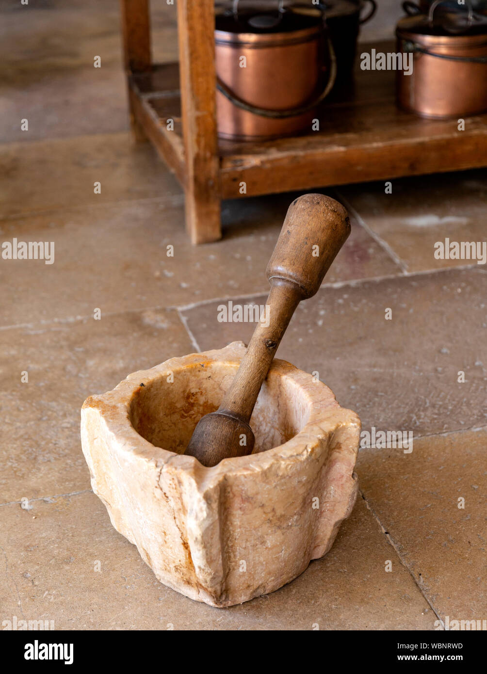 Old pestle and mortar on the floor of Pena Palace kitchen, Sintra ...