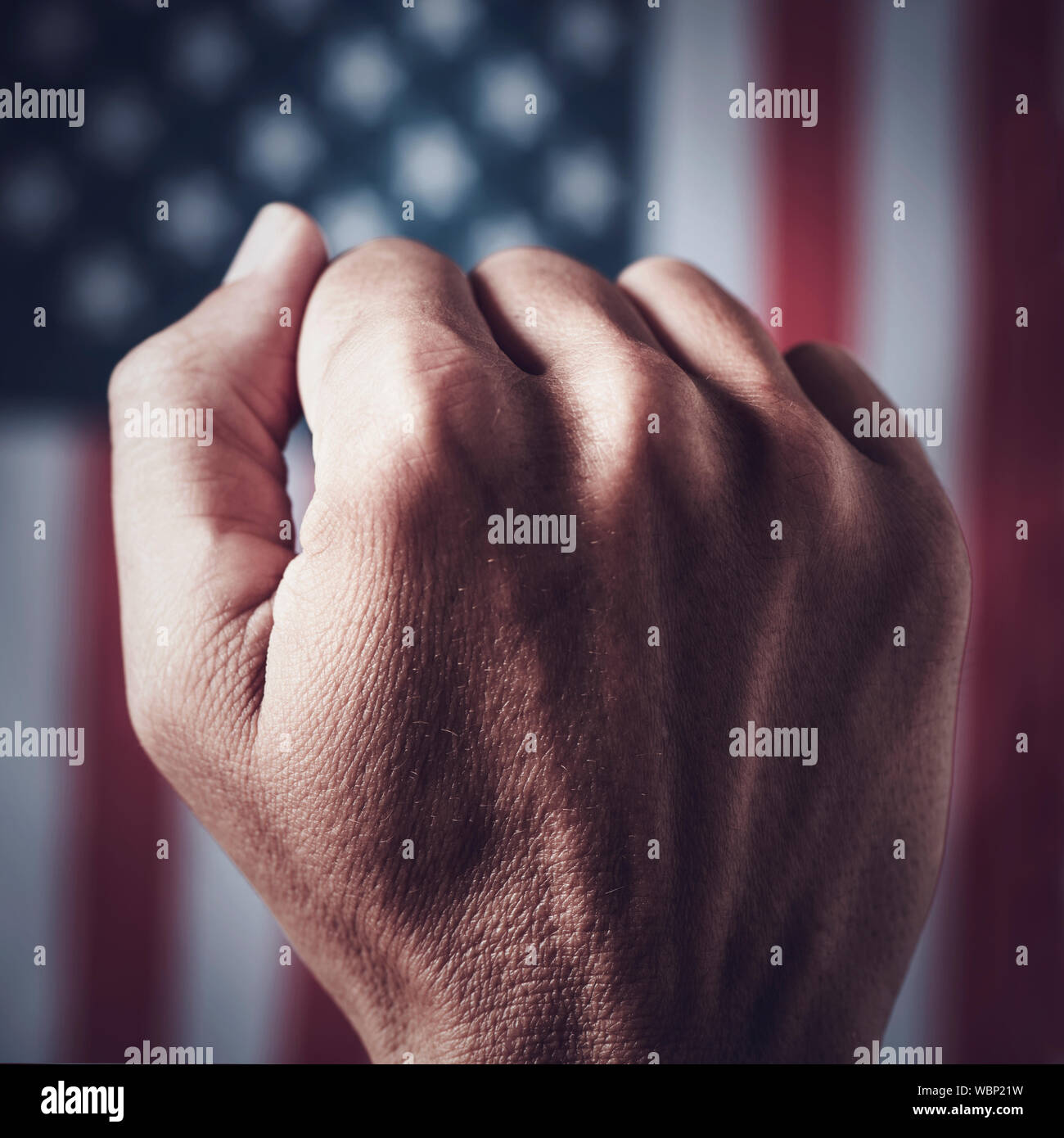 Raised fist flag hi-res stock photography and images - Alamy
