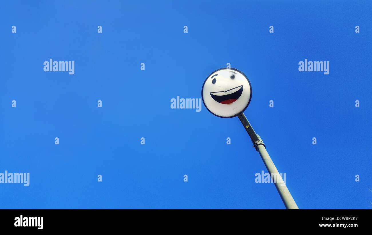 Smiley face blue hi-res stock photography and images - Alamy