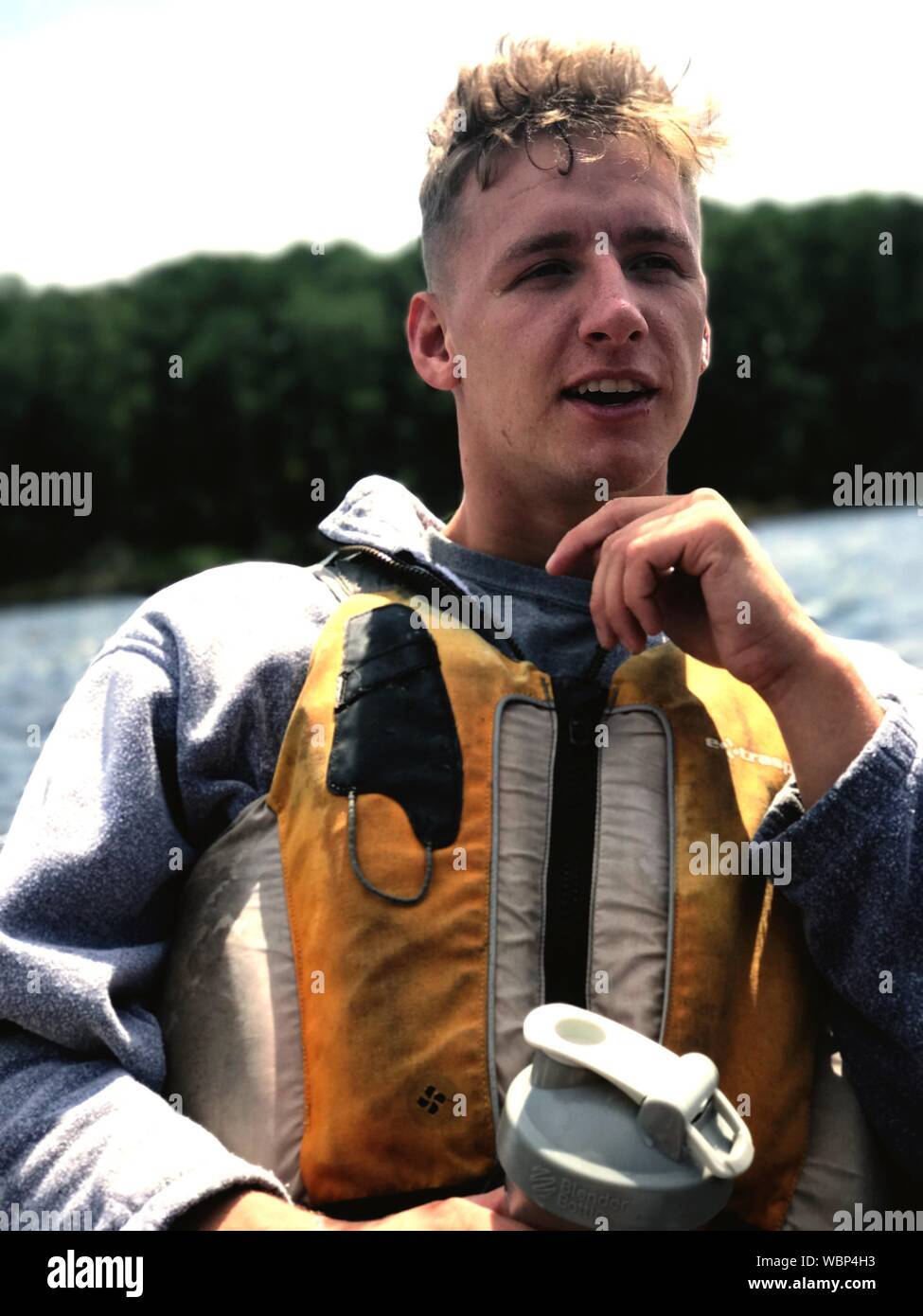 Man with life jacket hi-res stock photography and images - Alamy