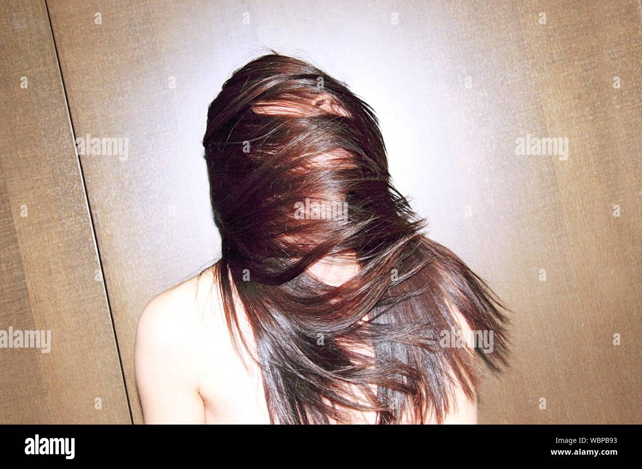 Woman Face Covered Hair Standing High Resolution Stock Photography and ...