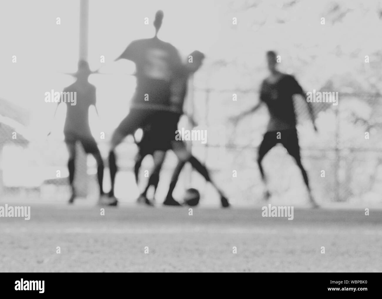 Friends playing football hi-res stock photography and images - Alamy