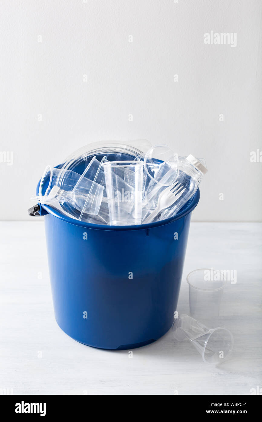 clean recyclable plastic bottles, containers, cups in garbage bin ...