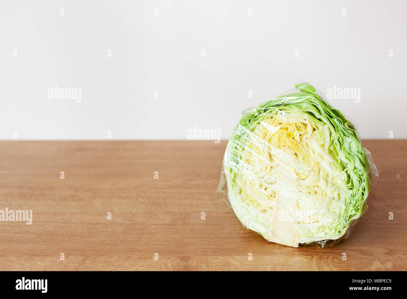 cabbage vegetable in plastic bag. single use plastic packaging issue ...