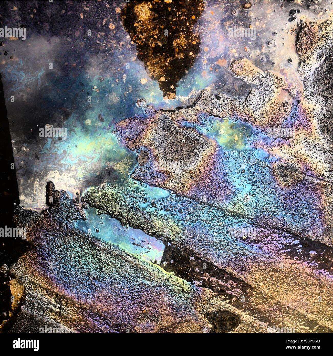 Puddle of oil hi-res stock photography and images - Alamy