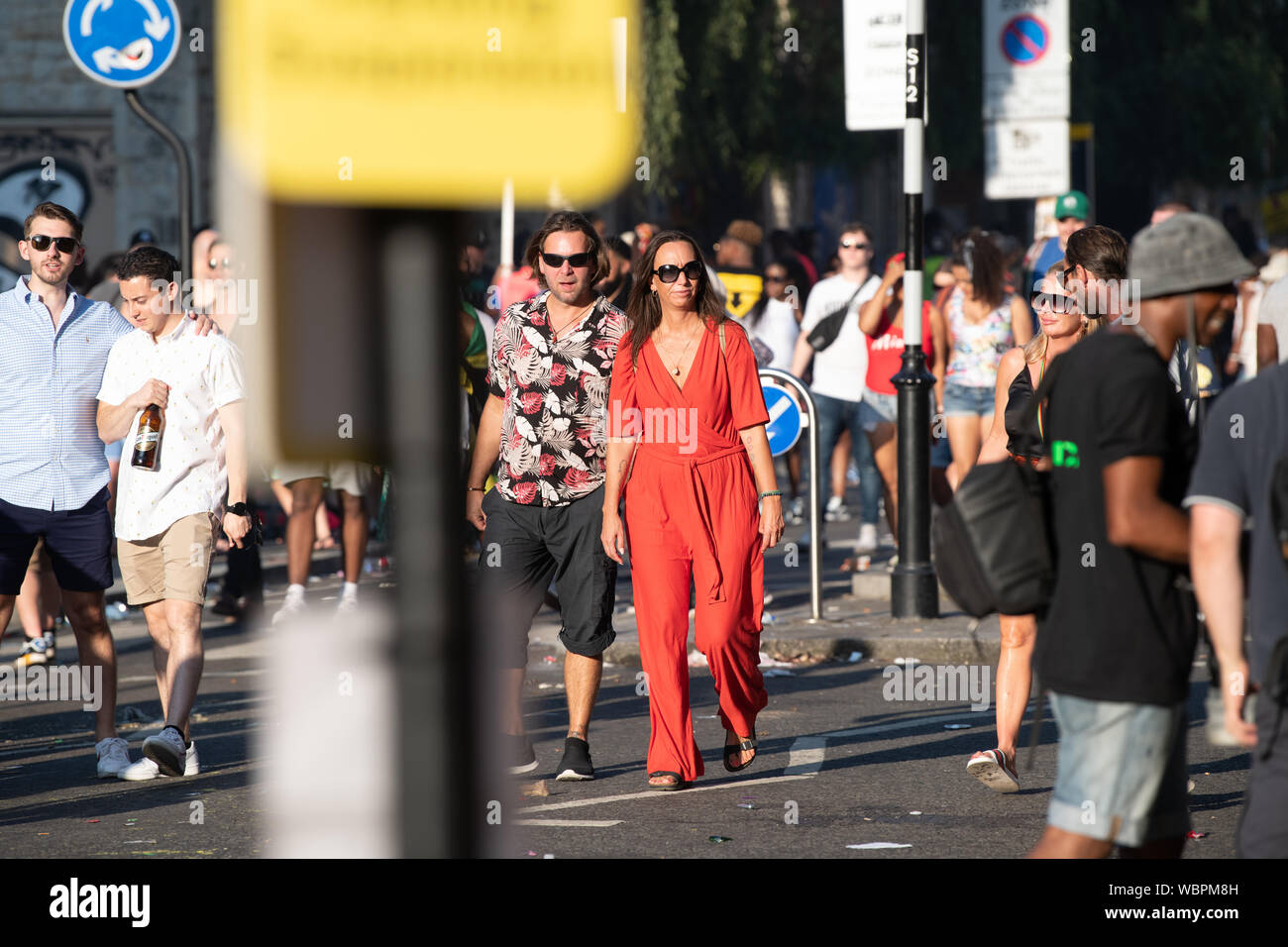 A busy crowd of people walking through Notting Hill Carnival Stock ...