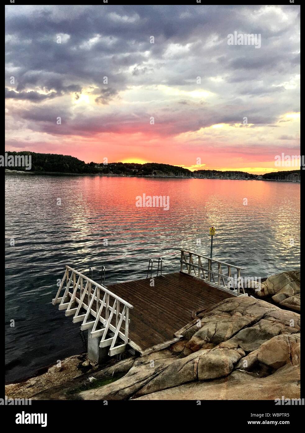 Rocks in water jetty hi-res stock photography and images - Alamy