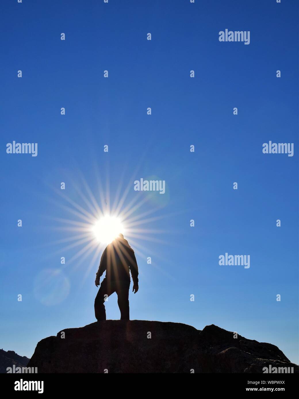 Silhouette of man in the sun hi-res stock photography and images - Alamy