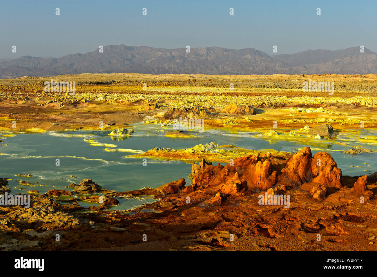 Sulphure rock formations in an acid brine pool, geothermal field of ...