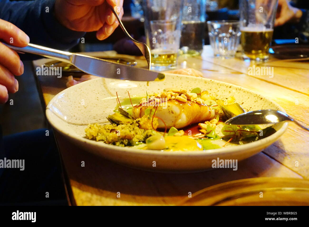 Human hand holding knife fork hi-res stock photography and images - Alamy