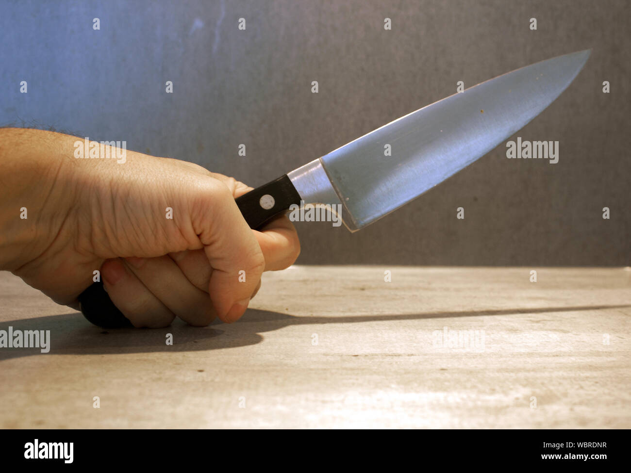 Kitchen knife hand hi-res stock photography and images - Alamy