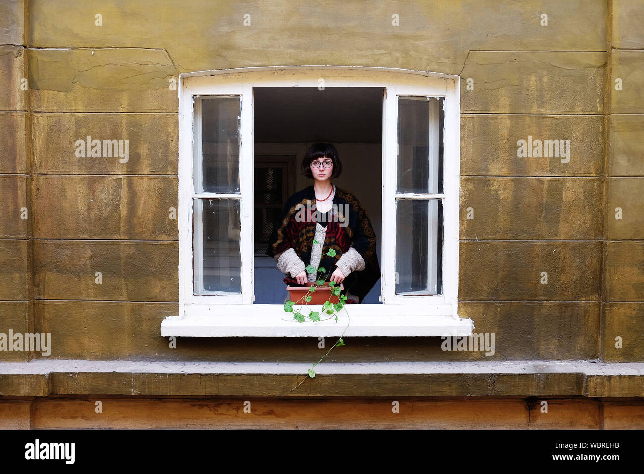 Standing in window hi-res stock photography and images - Alamy