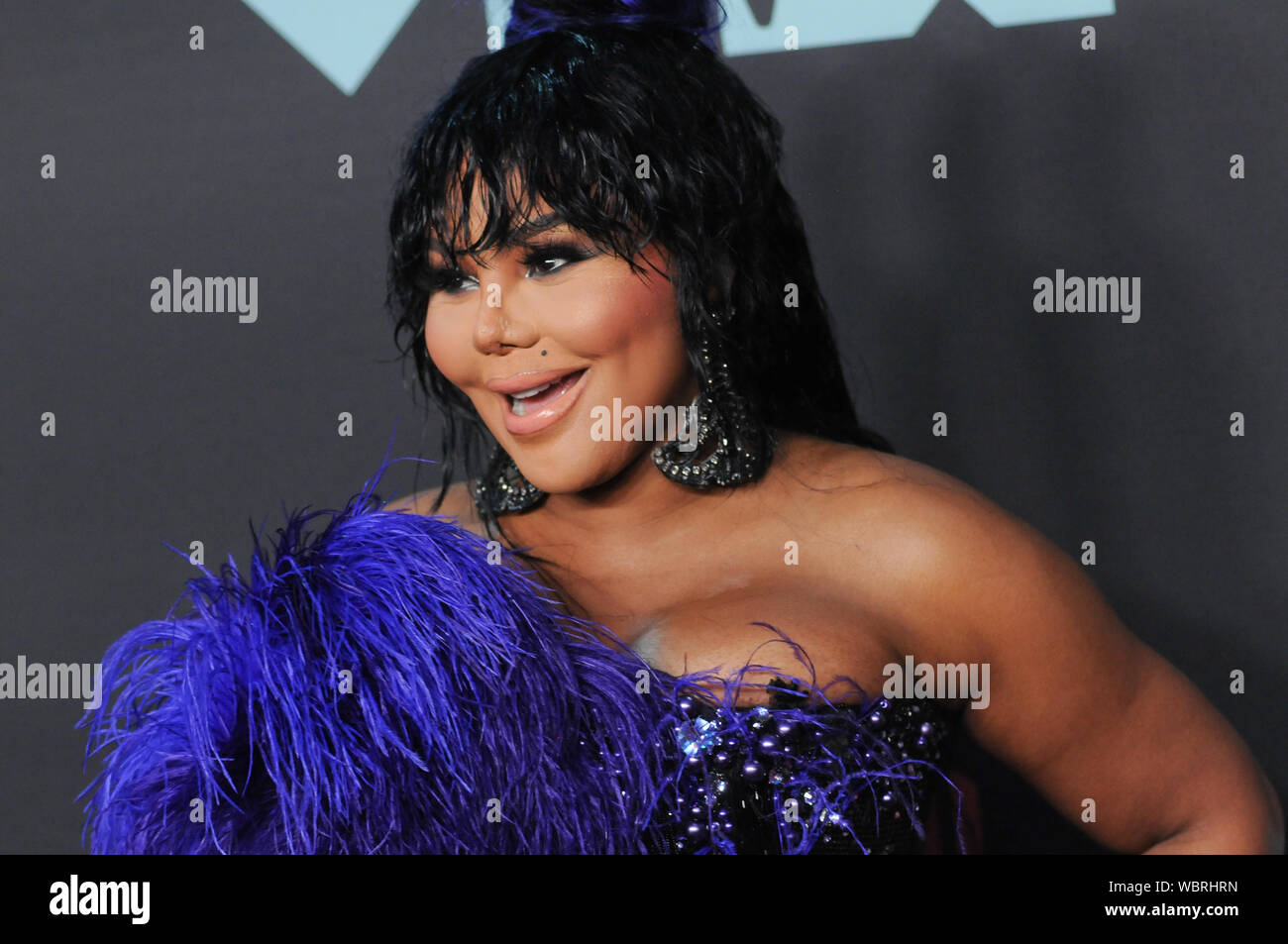 Newark, USA. 27th Aug, 2019. Lil' Kim (Kimberly Denise Jones) attends ...