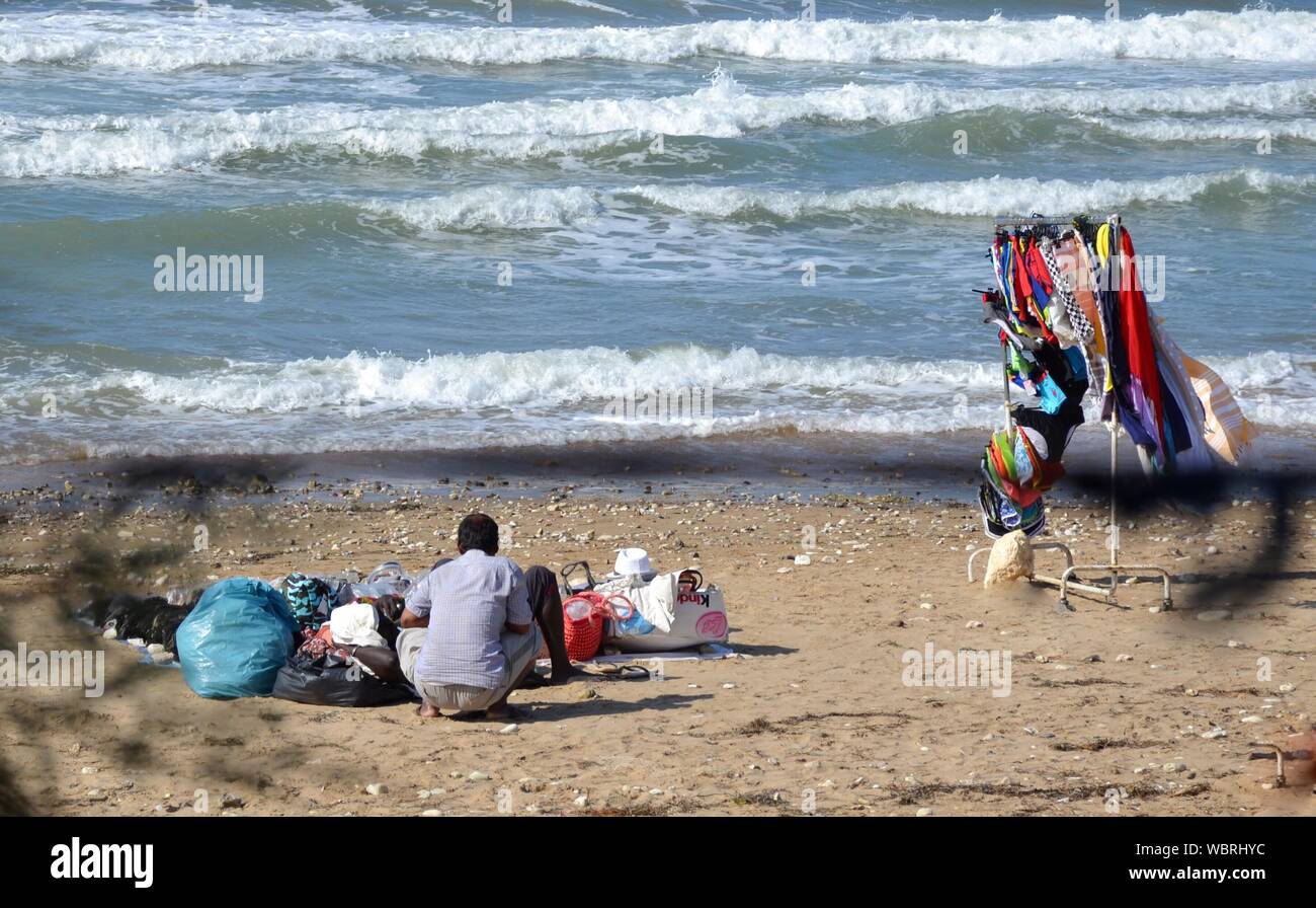 Men On Shore At Beach Stock Photo - Alamy