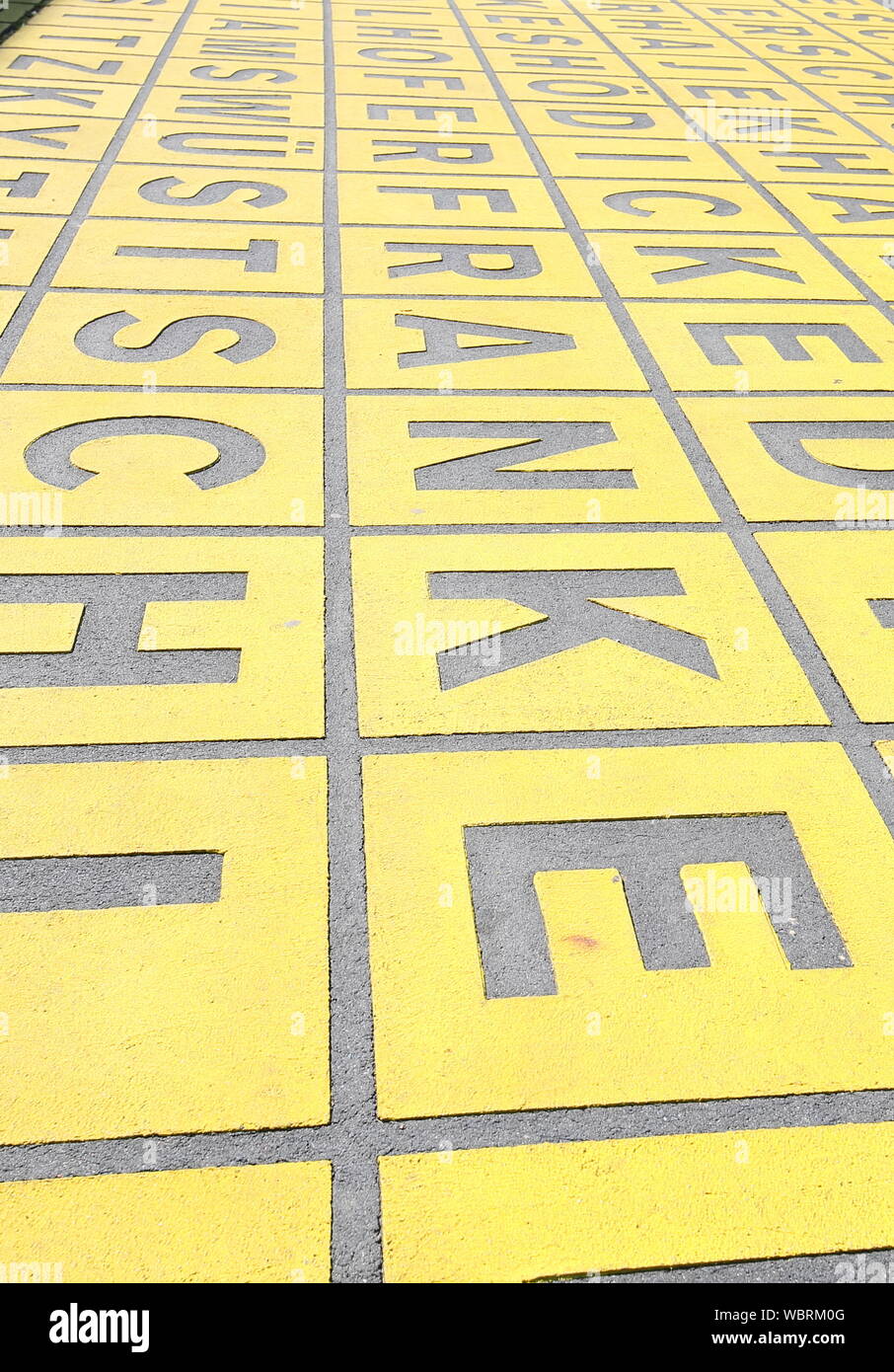 Alphabet lined in yellow background Stock Photo - Alamy