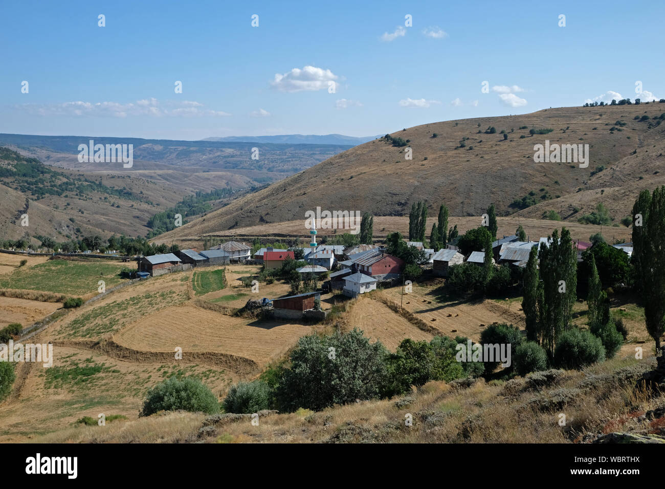 The different colors of the crops planted at different times provide ...