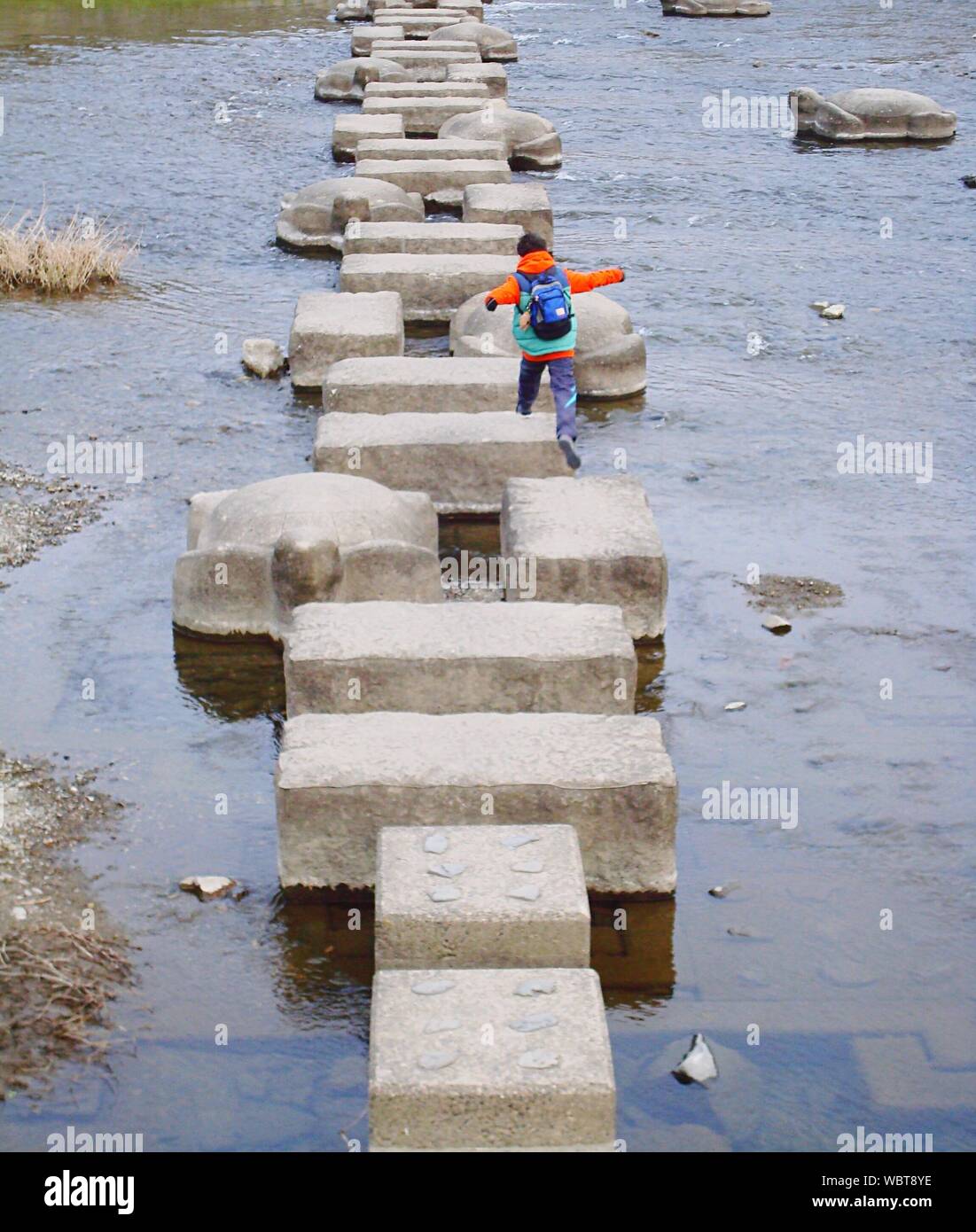 Boy stepping hi-res stock photography and images - Alamy
