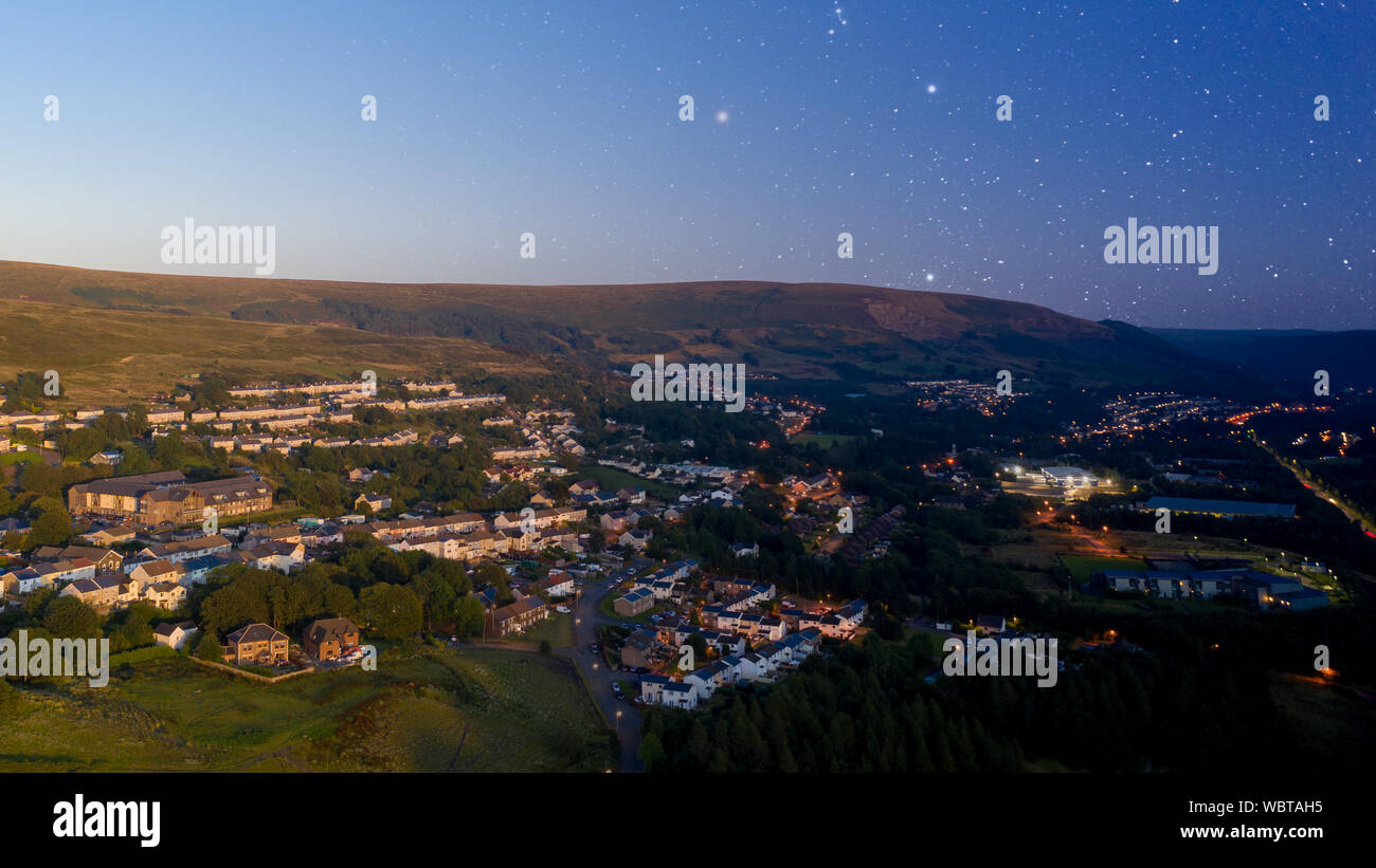 Day and night concept of summer landscape panoramic image of rural town ...