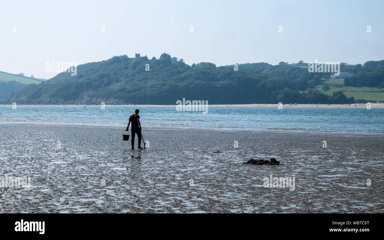Digging for cockles hi-res stock photography and images - Alamy