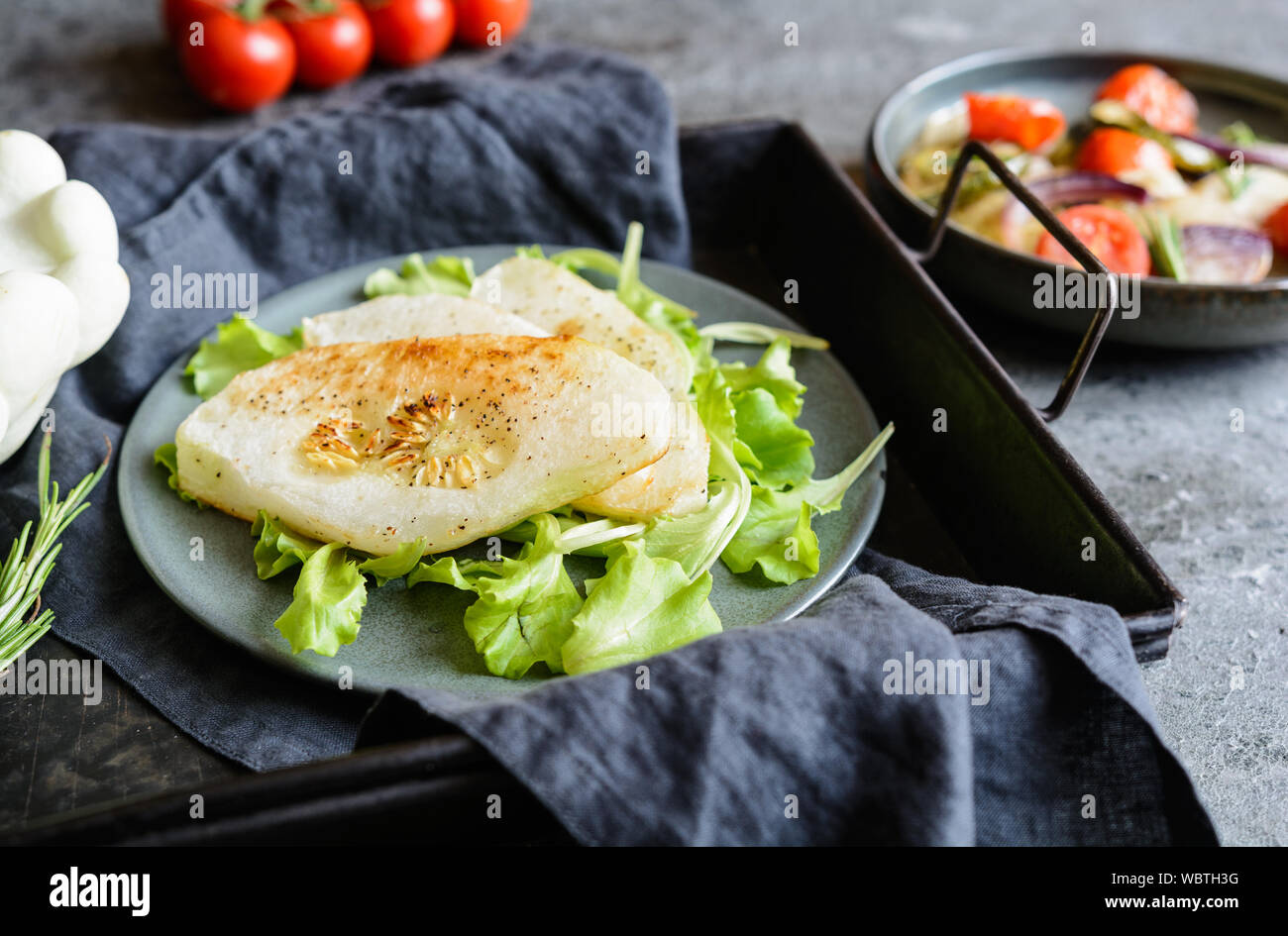 Fried white patty pan squash slices with roasted fennel, tomatoes ...