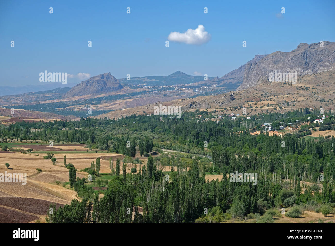 The different colors of the crops planted at different times provide ...