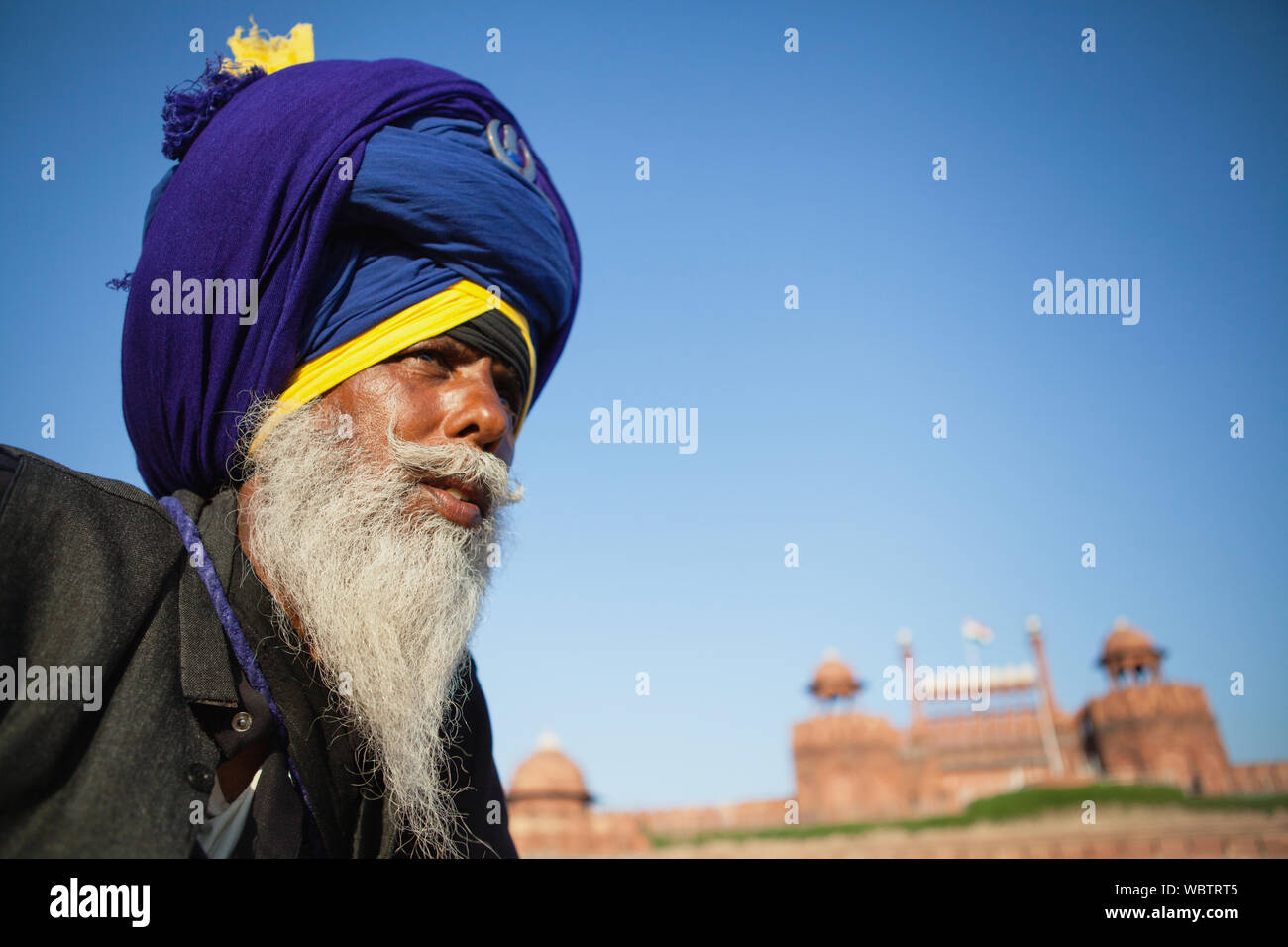 India, Delhi, Portrait of a male Sikh in front of the Red Fort in Delhi ...