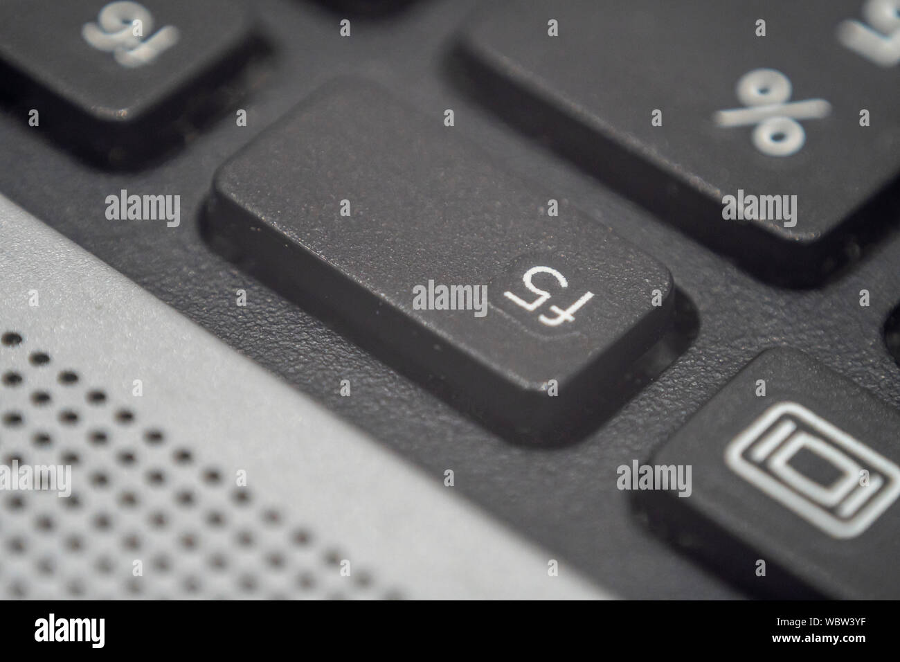 Extreme macro of the f5 key on a laptop keyboard Stock Photo - Alamy