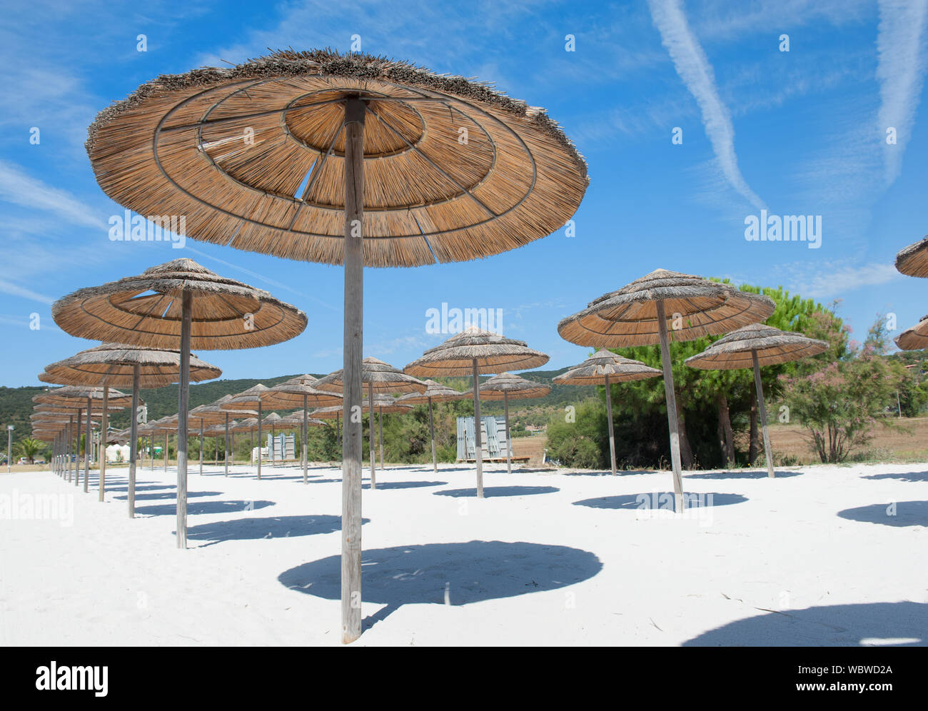 Parasols blue sky shadow hi-res stock photography and images - Alamy