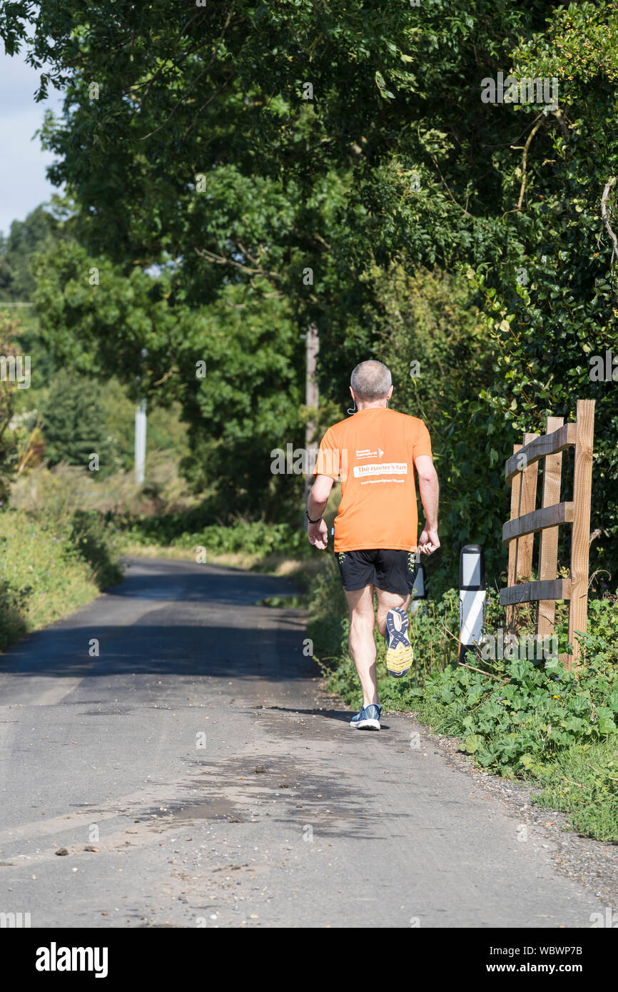 Running for charity Stock Photo - Alamy