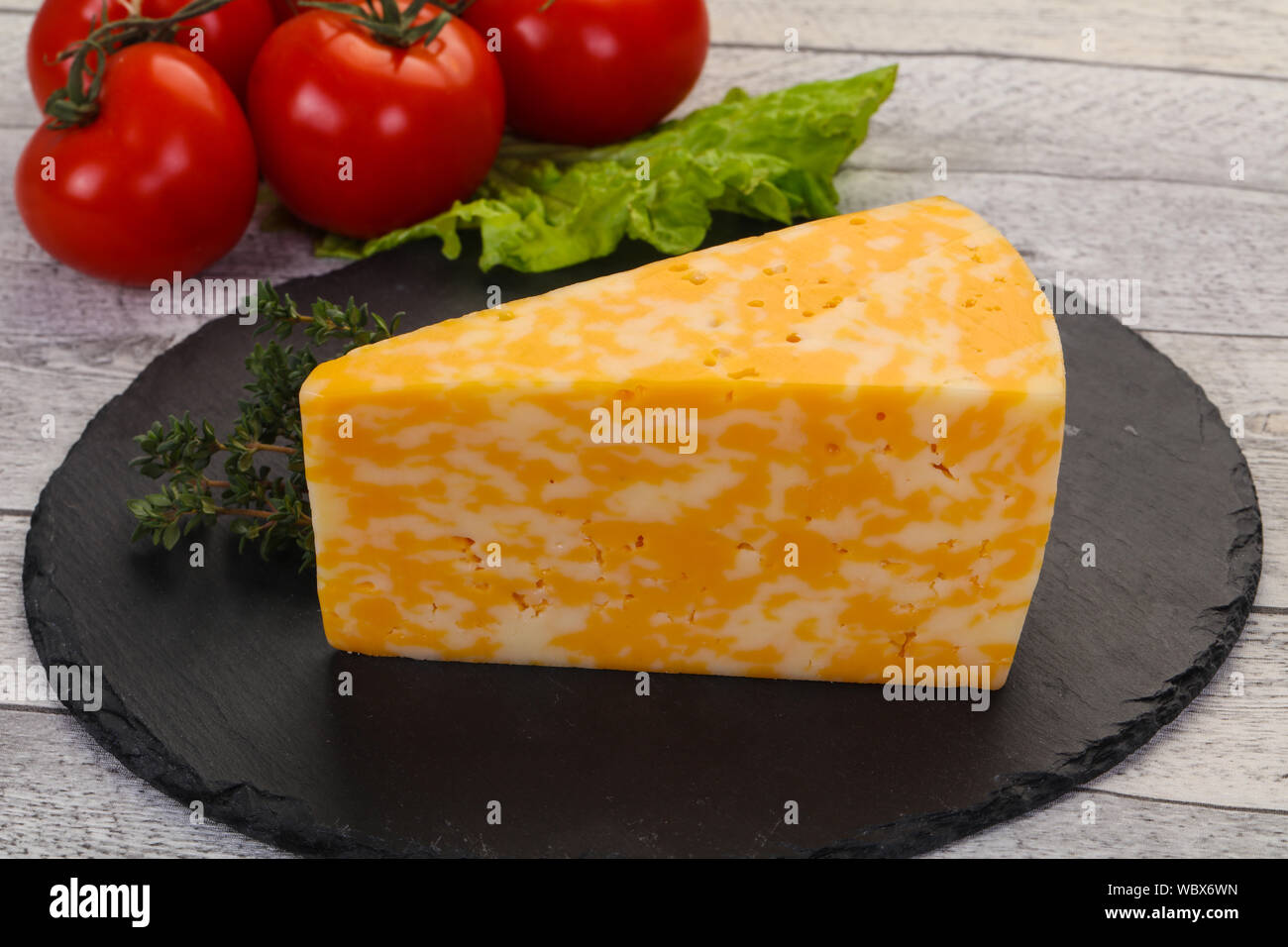 Marble delicous cheese served thyme Stock Photo - Alamy