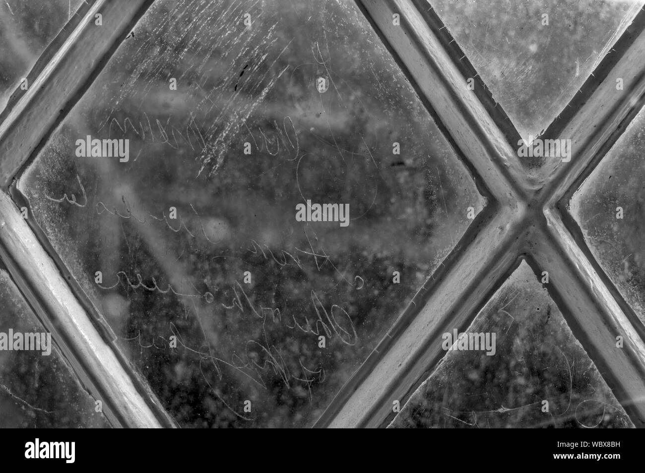 Graffiti on glass window Black and White Stock Photos & Images - Alamy