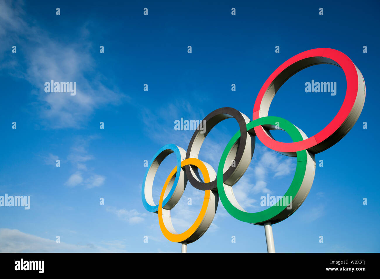 RIO DE JANEIRO - MARCH 18, 2016: A large set of Olympic rings shines in ...