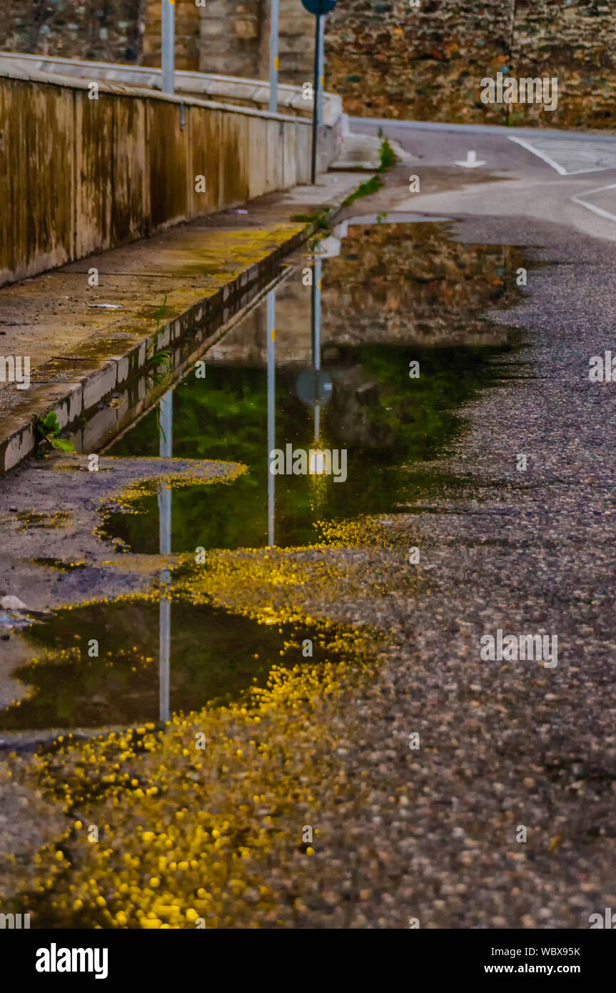 Puddles in the street hi-res stock photography and images - Alamy
