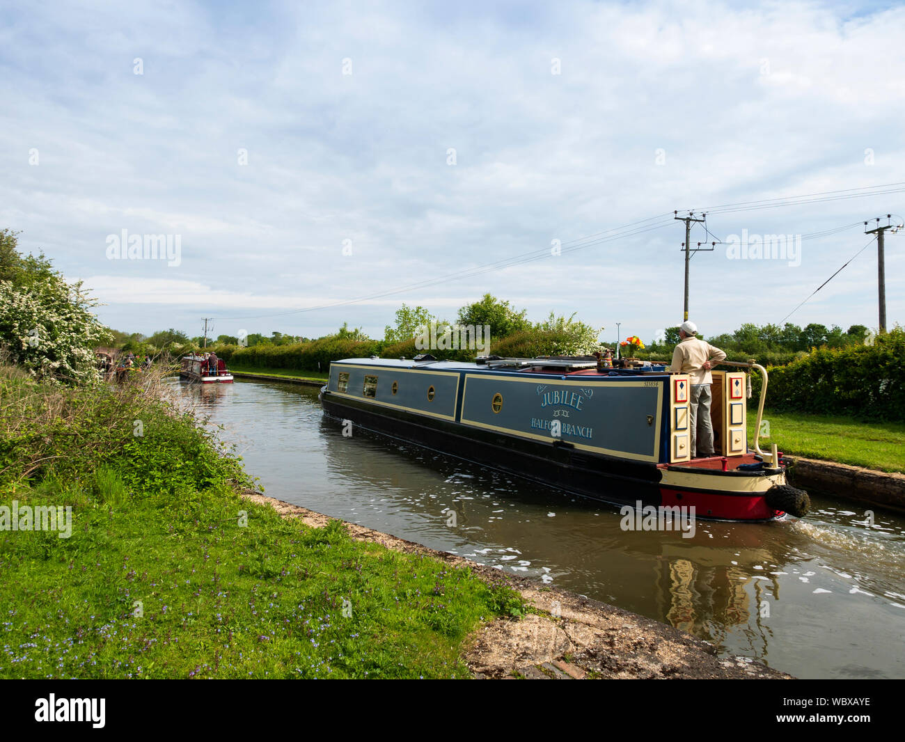 Canal boat exiting a lock, The Grand Union Canal, Northamptonshire ...