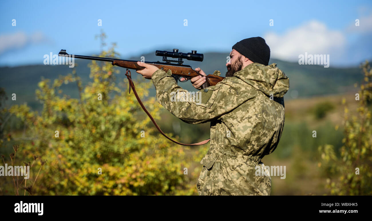 Focus and concentration of experienced hunter. Hunting and trapping ...