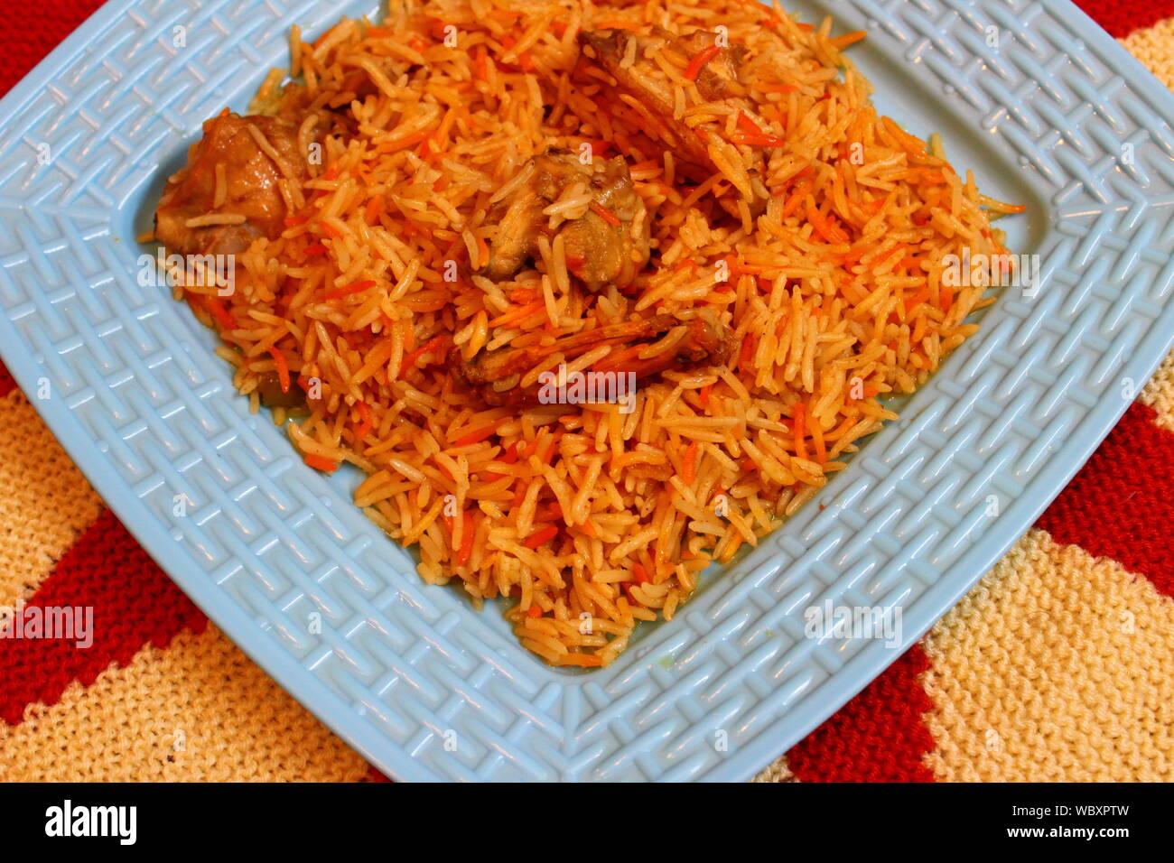 Closeup of chicken biryani in a plastic plate Stock Photo - Alamy