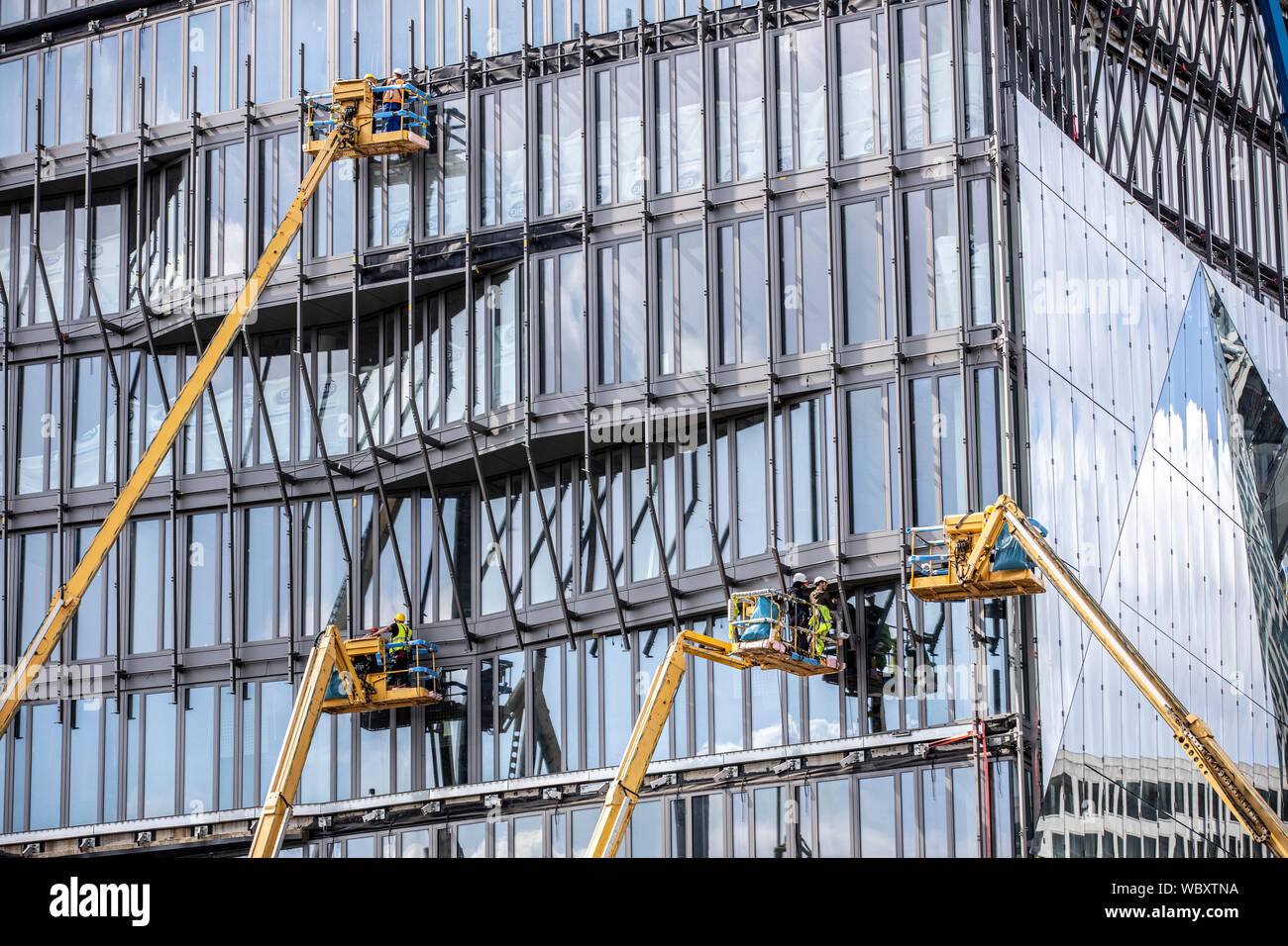Construction site, facades Work on the new Cube building, at the main ...