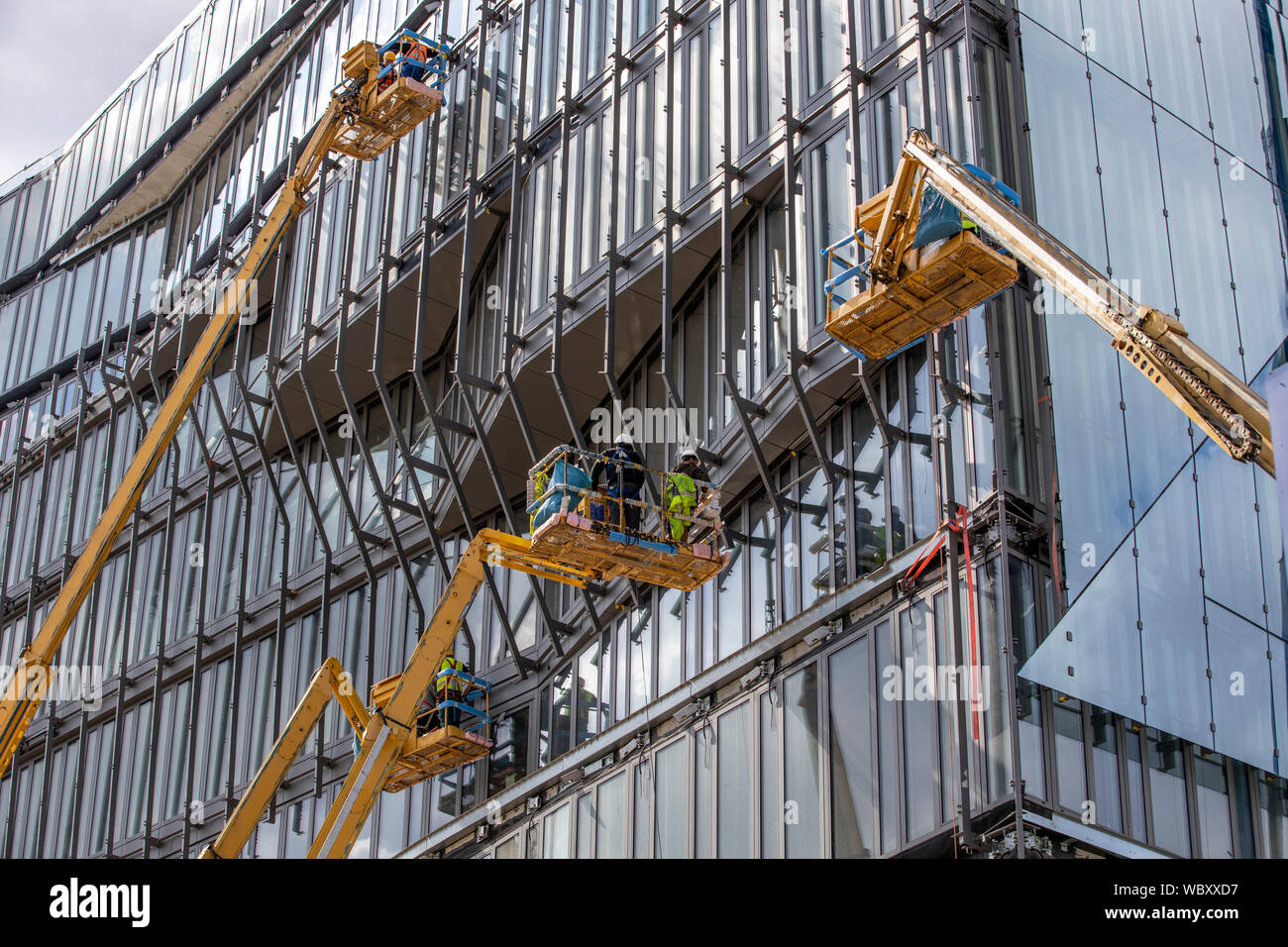 Construction site, facades Work on the new Cube building, at the main ...