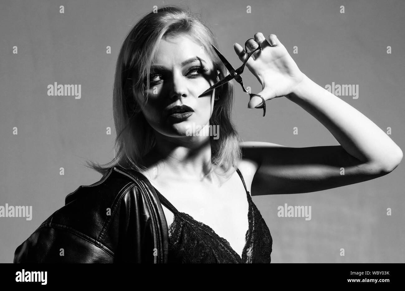 Steel scissors. Fashion lady glamorous girl professional hairdresser ...